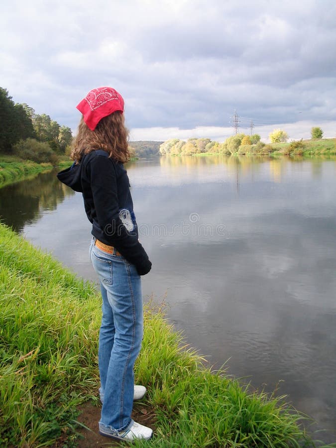 Girl looking at water stock image. Image of lake, female - 4157097