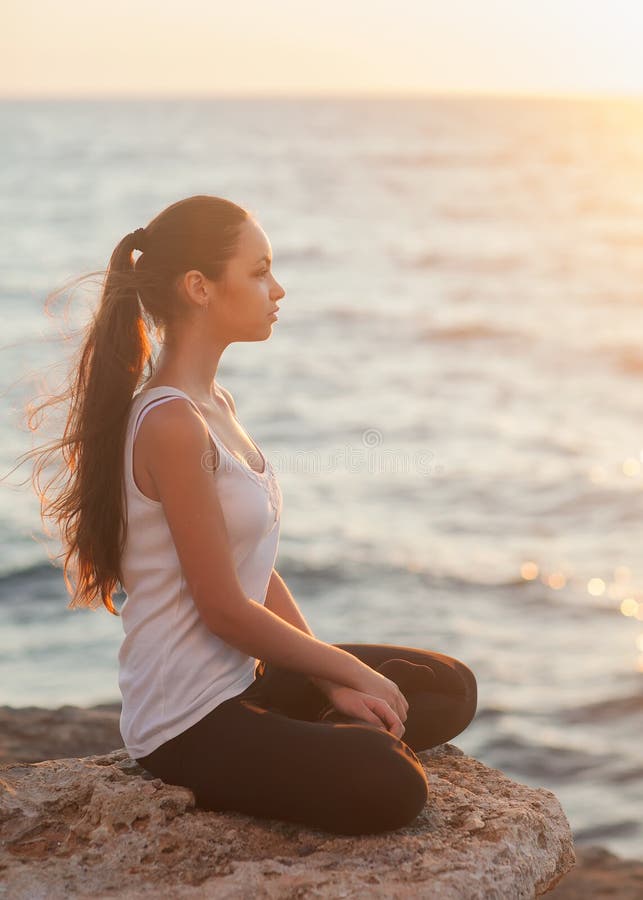 Girl in Lotus Pose at Sunset Stock Image - Image of body, nature: 33350045