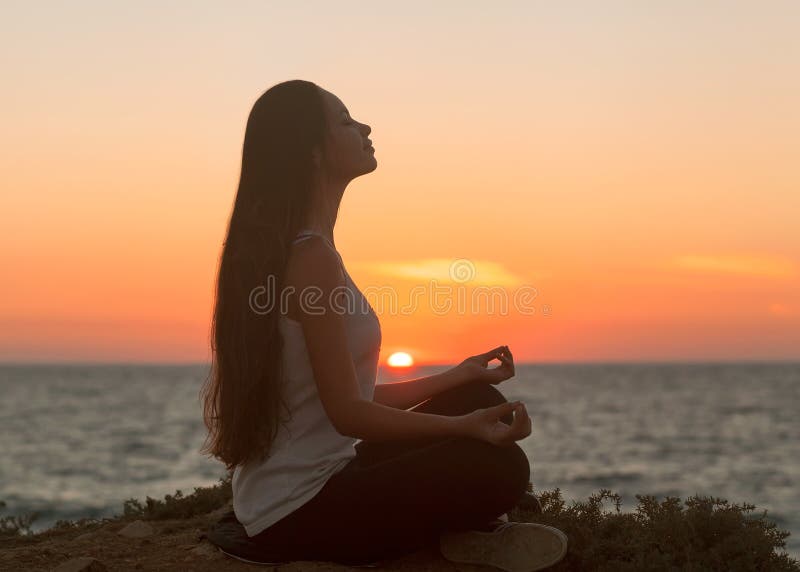 Girl in Lotus Pose at Sunset Stock Image - Image of girl, natural: 33350049