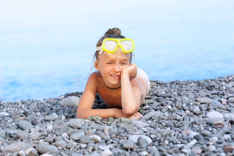 Girl lying on the beach stock image. Image of life, enjoyment - 66009193