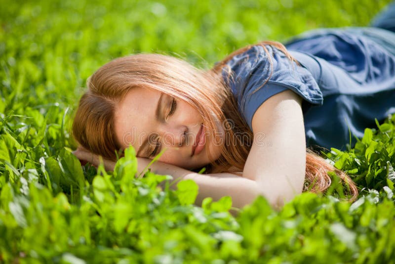 Girl Lying on the Grass and Sleeping Peacefully Stock Image - Image of ...