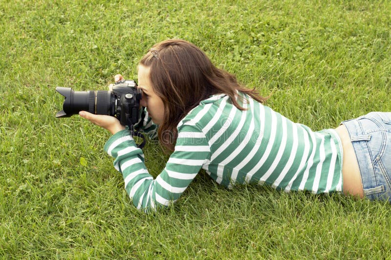 Girl Lying with Photo Camera Stock Photo - Image of lens, outdoor: 3080180