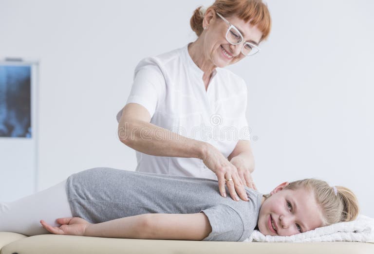 Girl Lying on Physiotherapy Table Stock Photo - Image of patient ...