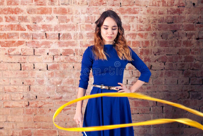 Girl with a yellow ribbon stock image. Image of female - 110437845