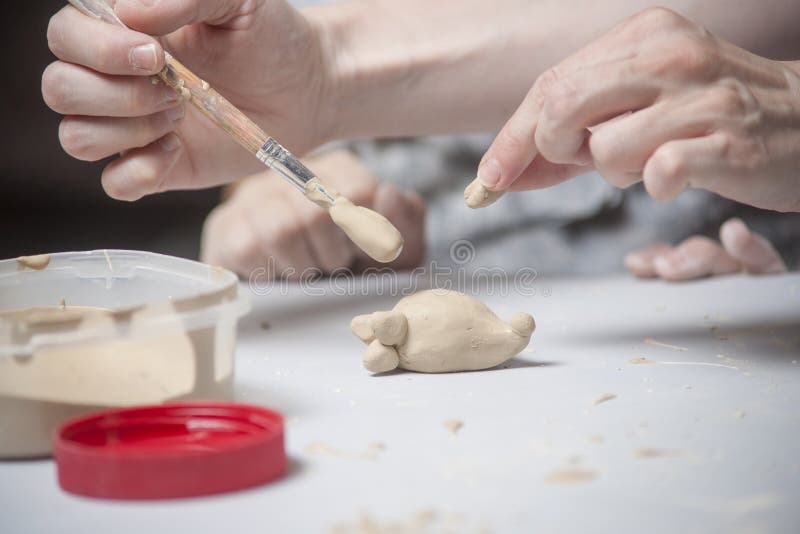 Girl make toy from clay stock photo. Image of lifestyle - 34877920