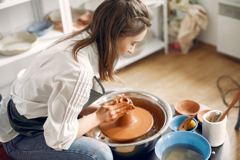 Girl Making a Vaze from a Clay on a Pottery`s Machine Stock Image ...