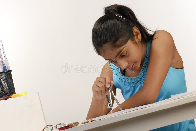 Asian Teen, Intensely Playing or Working on a Laptop Computer Stock ...