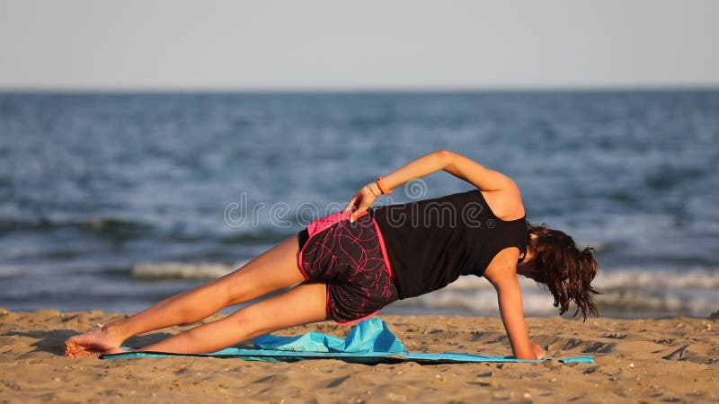 Girl Makes Exercises on the Beach by the Sea Stock Video - Video of ...