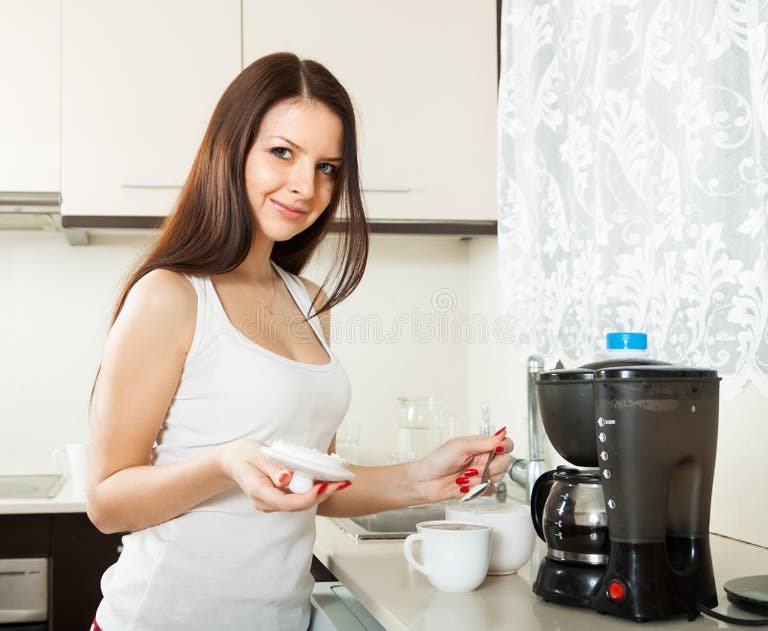 Girl making coffee. stock photo. Image of breakfast, home - 38969960