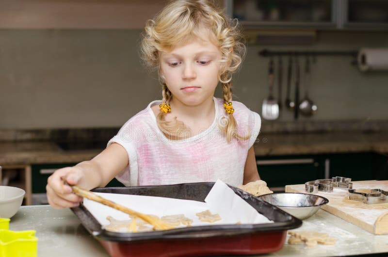 Girl making cookies stock photo. Image of child, cake - 63390592