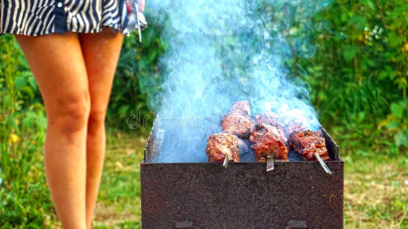 Girl making food on grill stock photo. Image of organic - 234974812
