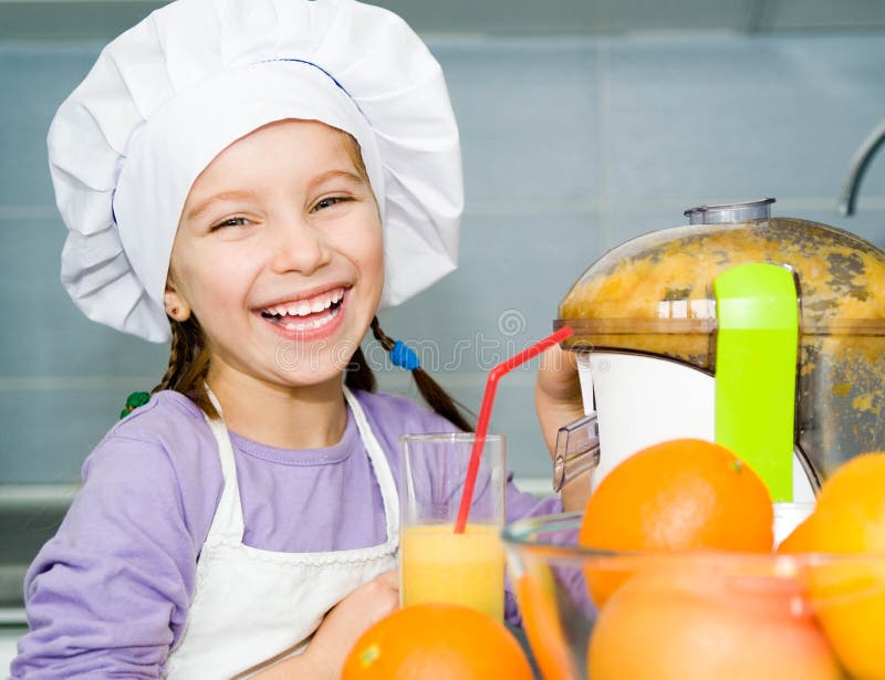 Girl making fresh juice stock photo. Image of interior - 34532238