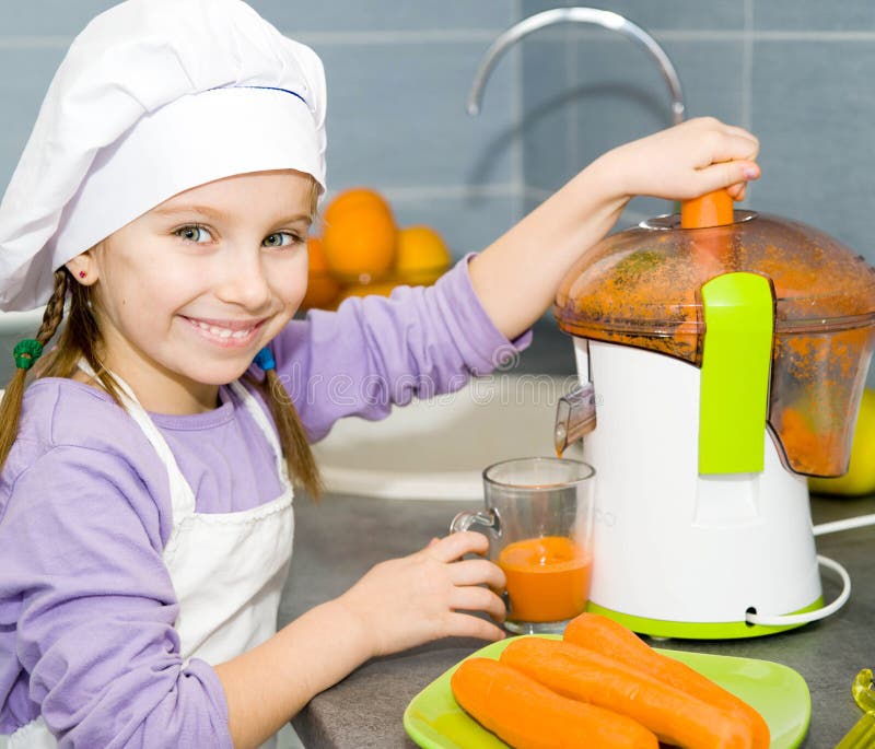 Girl making fresh juice stock image. Image of child, house - 28714393