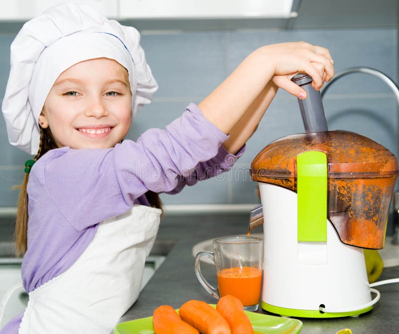 Girl making fresh juice stock photo. Image of interior - 34532238