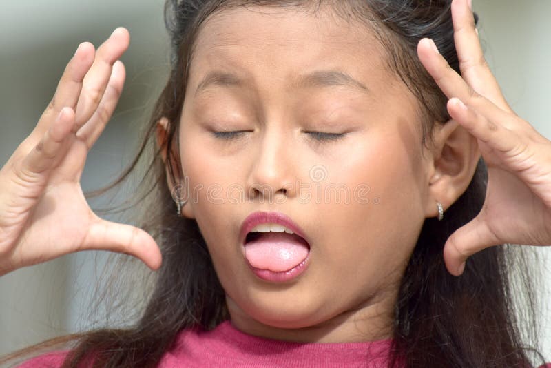 Girl Making Funny Faces stock image. Image of joyful - 152088719