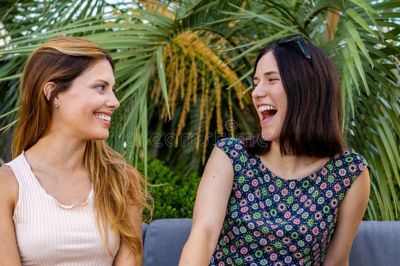 A Girl Making Her Best Friend Laugh Stock Image - Image of outdoor ...