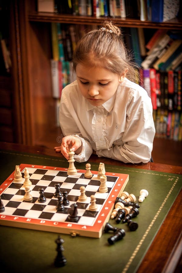 Girl Making Move on Chess Board Stock Photo - Image of closeup, game ...