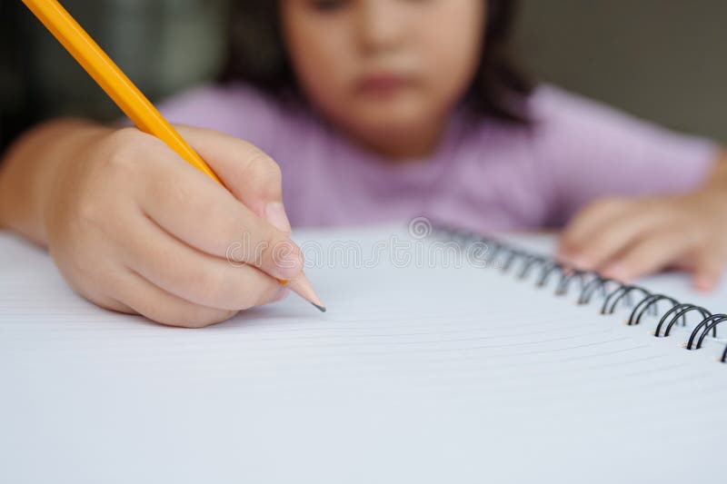 Girl Making Notes in Notebook Stock Photo - Image of caucasian, serious ...