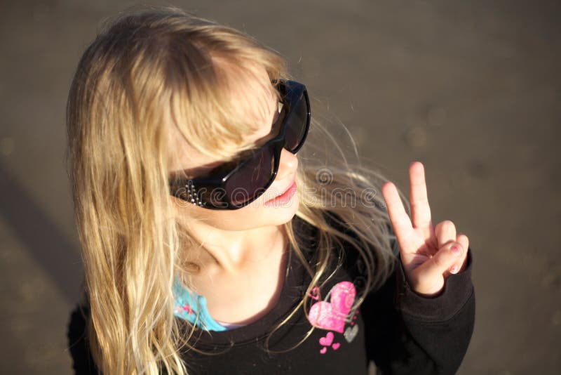 Girl making peace sign stock photo. Image of nature, sunglasses - 17018962