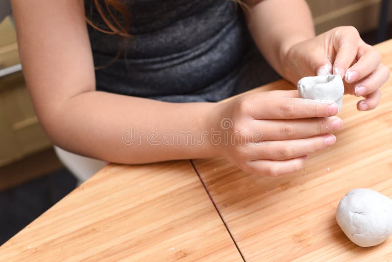 Girl Making Pottery Models with White Clay at Home Stock Image - Image ...