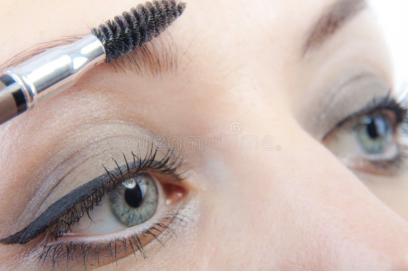 Girl making up stock image. Image of closeup, cosmetics - 28340655