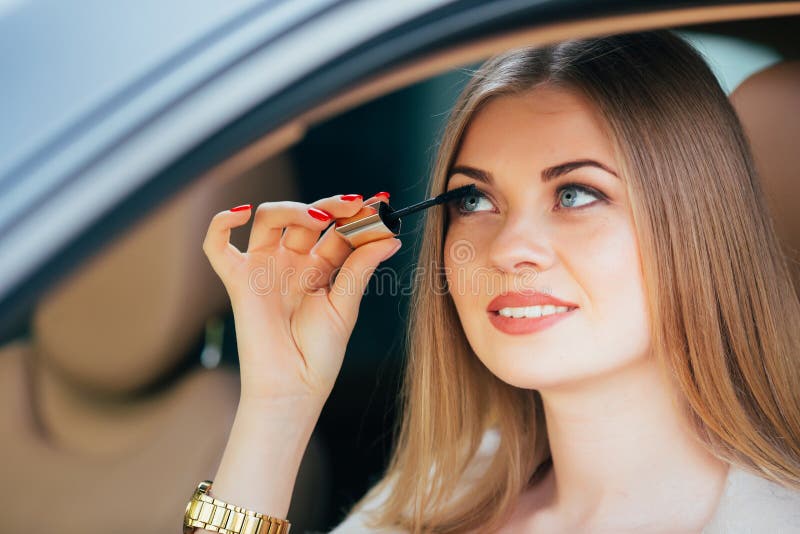 Girl making up a car. stock image. Image of fashion, making - 75301257