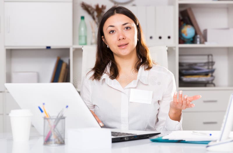 Girl Manager Working with Laptop and Documents at Table in Office Stock ...
