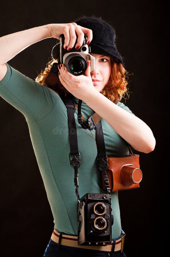 Girl with many cameras stock image. Image of blouse, hand - 9250355
