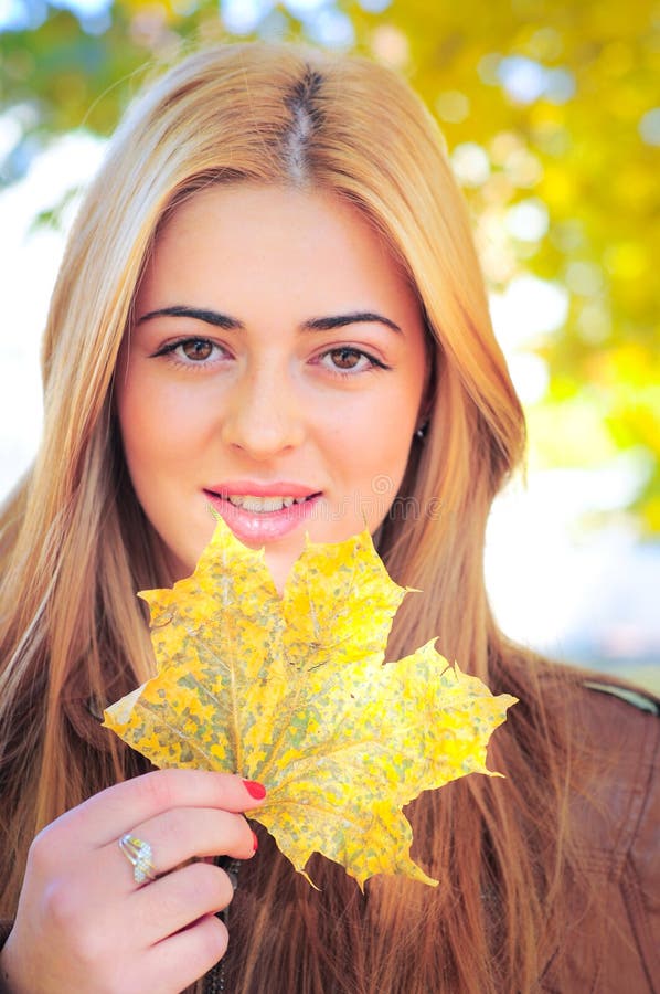 Girl with maple leaf stock photo. Image of caucasian - 21804650