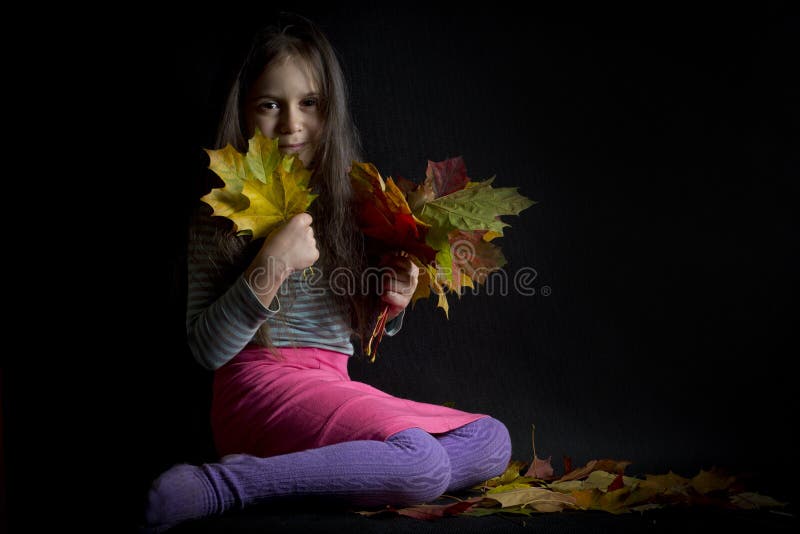 Girl with a maple leaf stock image. Image of girl, long - 101415517