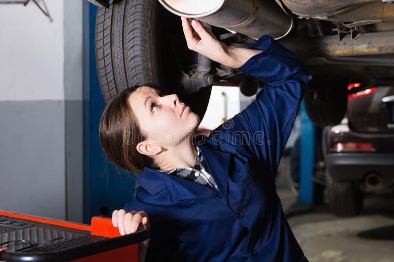Girl Master is Repairing Car in Workshop Stock Photo - Image of ...