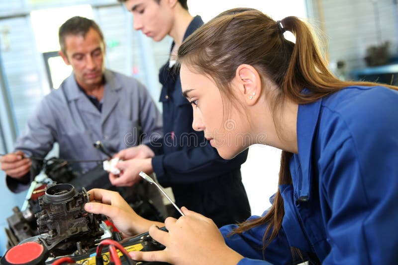 Girl in mechanics class stock image. Image of engineer - 32110911