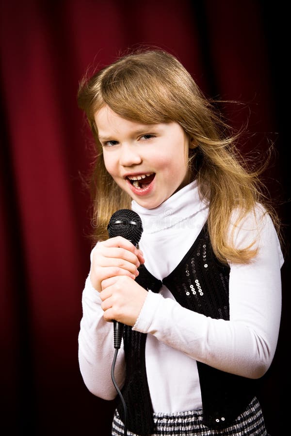 Girl with microphone stock photo. Image of kids, girls - 22446506