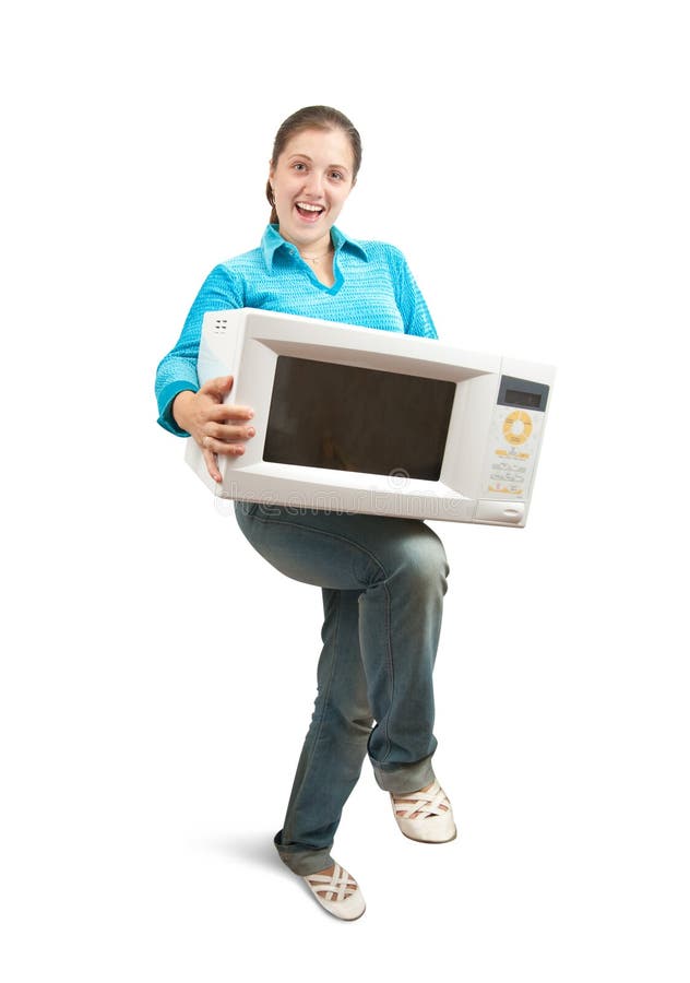 Girl with microwave oven stock photo. Image of housework - 16043086