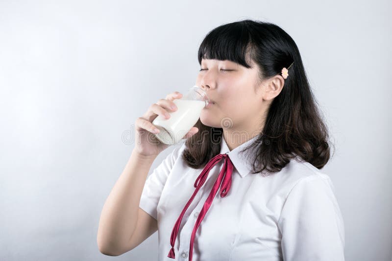 Girl with milk stock photo. Image of isolated, nutrition - 100463702