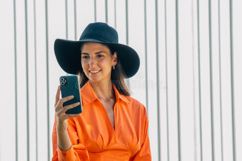 Girl with Mobile Phone and Hat Stock Photo - Image of hipster ...