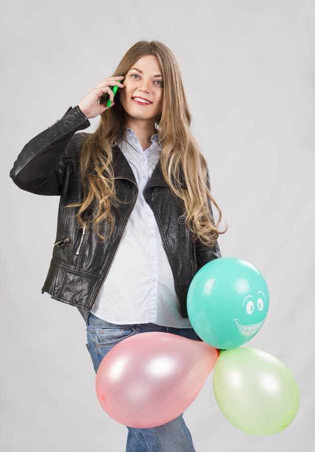 Girl Model in Studio with Balloons and Cell Phone Stock Photo - Image ...