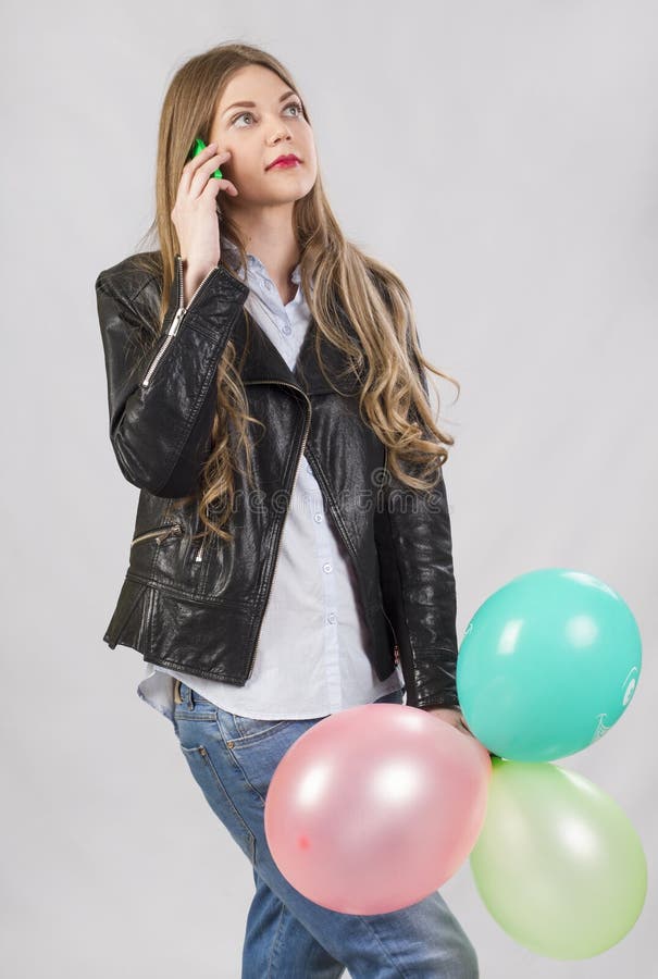 Girl Model in Studio with Balloons and Cell Phone Stock Photo - Image ...