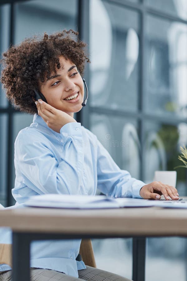 Girl in a Modern Office Working in a Call Center Smiling Stock Photo ...
