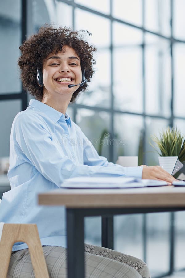 Girl in a Modern Office Working in a Call Center Smiling Stock Photo ...