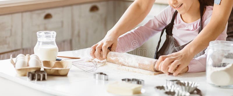 Girl and Mom Baking Together in Kitchen Using Rolling Pin Stock Photo ...