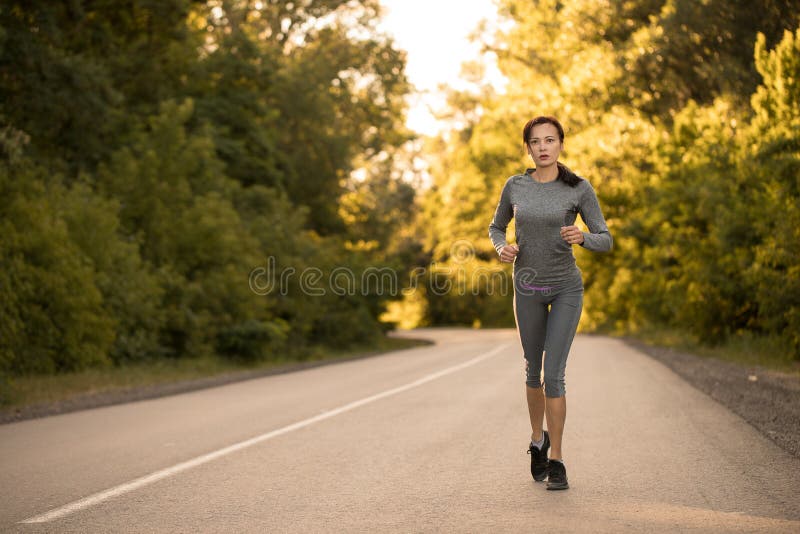 Girl on a morning run stock image. Image of hood, asian - 152375839