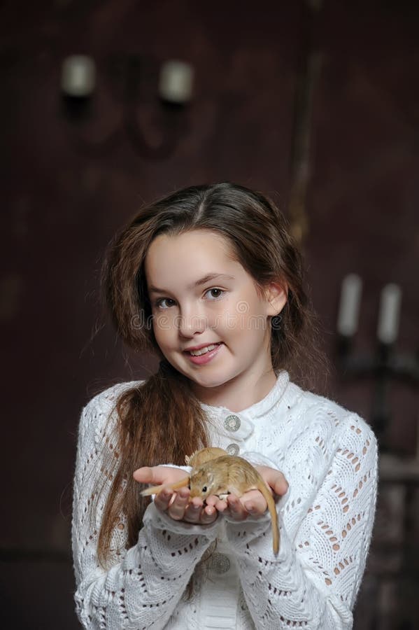 Girl with a mouse stock image. Image of holds, girl, brown - 28323879