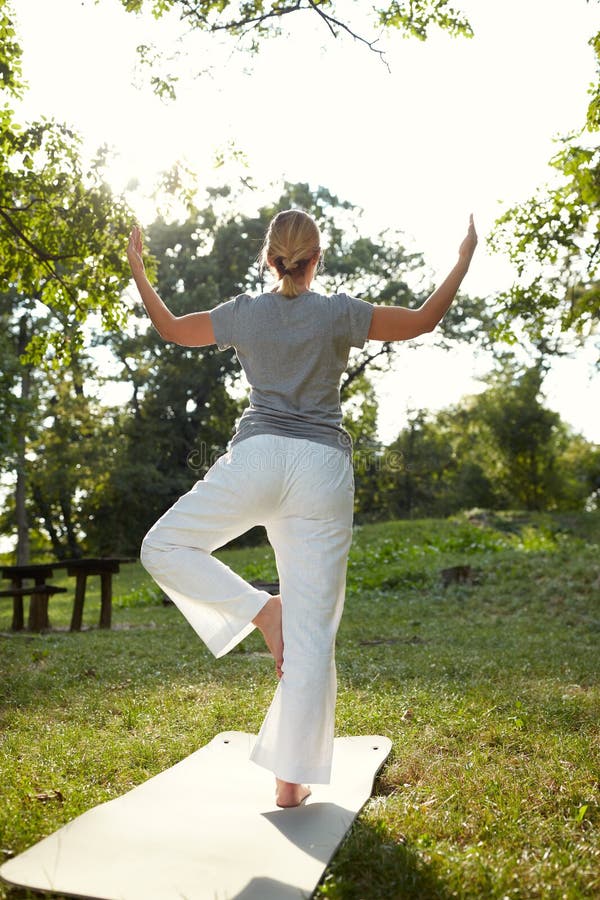 Girl Practicing Body Balance Exercises, Back View Stock Photo - Image ...