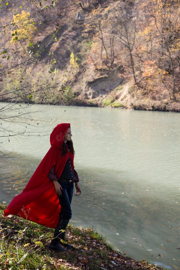 Girl on the Nature in a Red Cloak Stock Photo - Image of gentleness ...