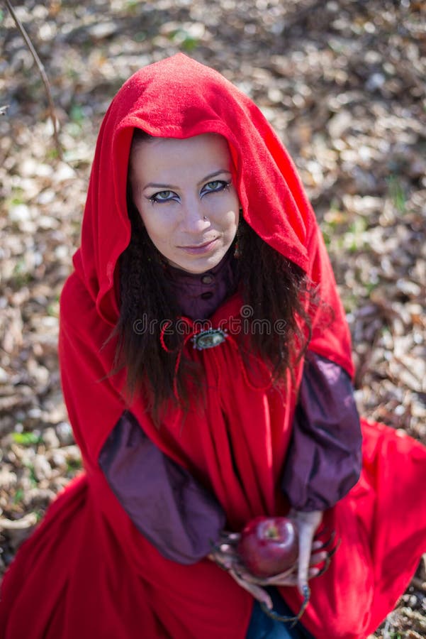 Girl on the Nature in a Red Cloak Stock Image - Image of cloak, eyes ...