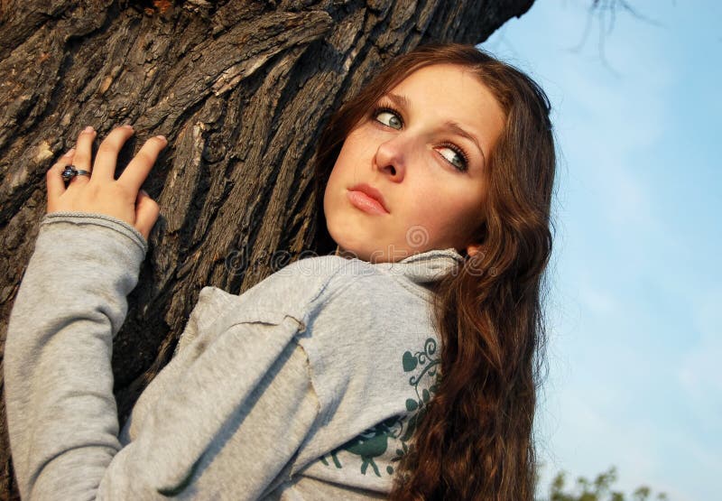 Girl near the tree stock image. Image of caucasian, cheerful - 4673369