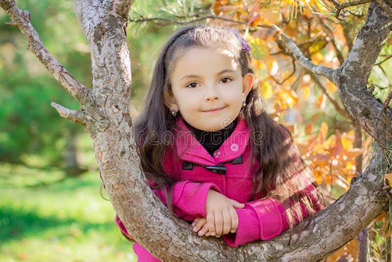 Girl Near a Tree in the Park Stock Photo - Image of little, green: 44825408