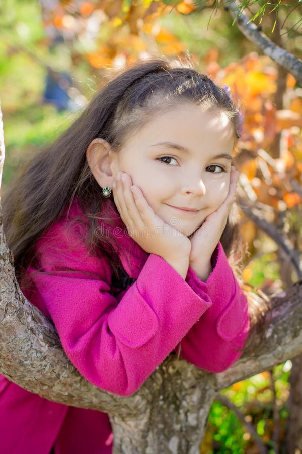 Girl Near a Tree in the Park Stock Image - Image of green, childhood ...