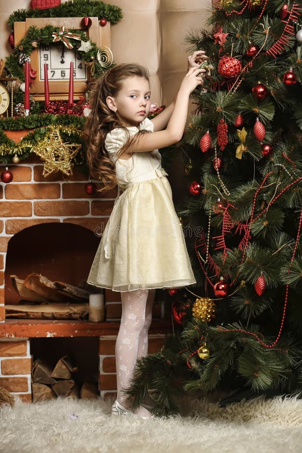 Girl Next To a Christmas Tree Stock Photo - Image of caucasian, child ...